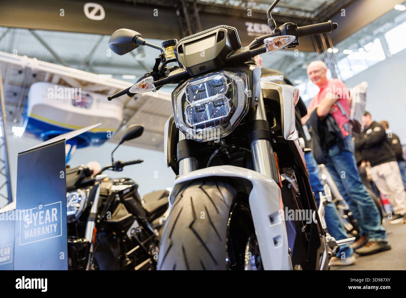 Visitors explore Triumph Motorcycles models, including modern classics ...