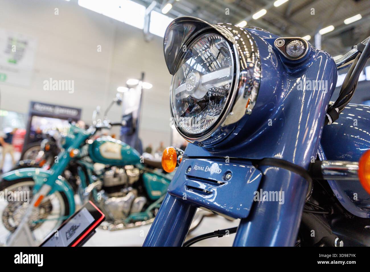 Visitors explore Triumph Motorcycles models, including modern classics ...