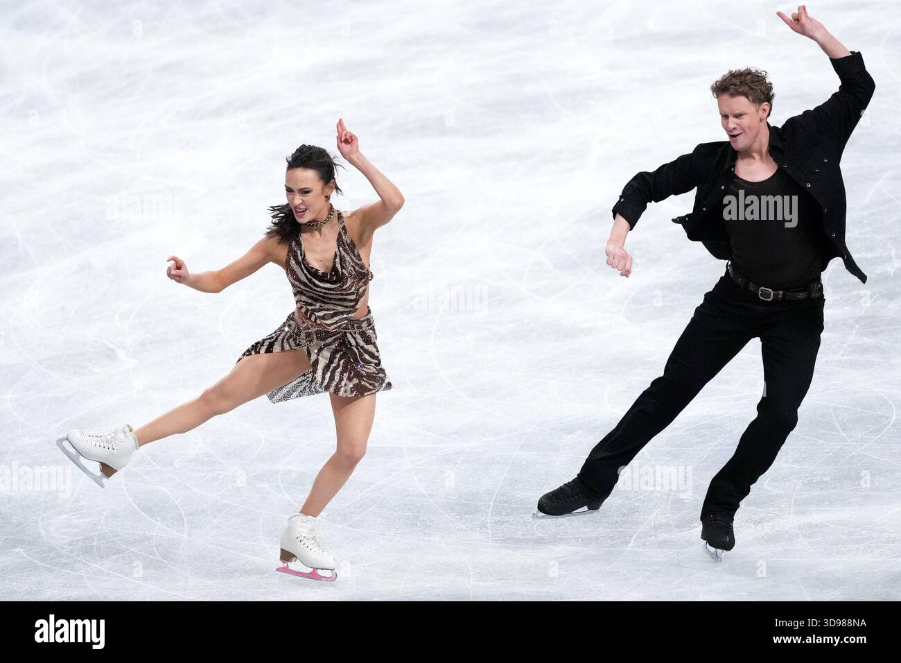 Madison Chock and Evan Bates, of the United States, compete in the ice ...