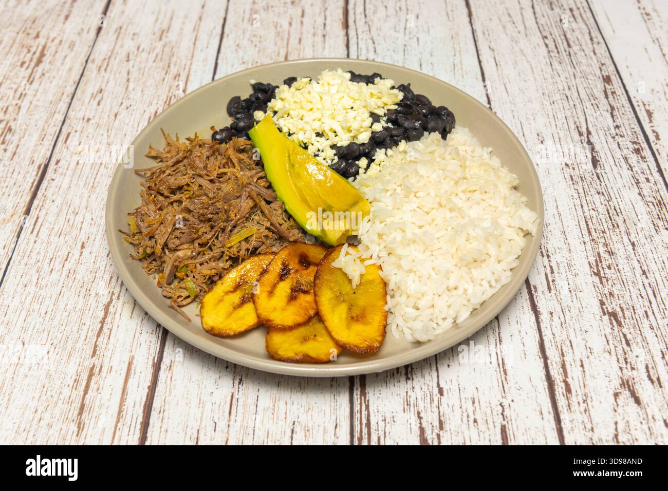 Modern version of Pabellón Criollo with shredded flank steak, rice with ...
