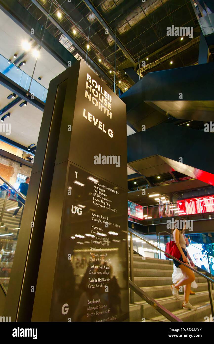 Looking up at Boiler House North Level G stairs and sign inside ...