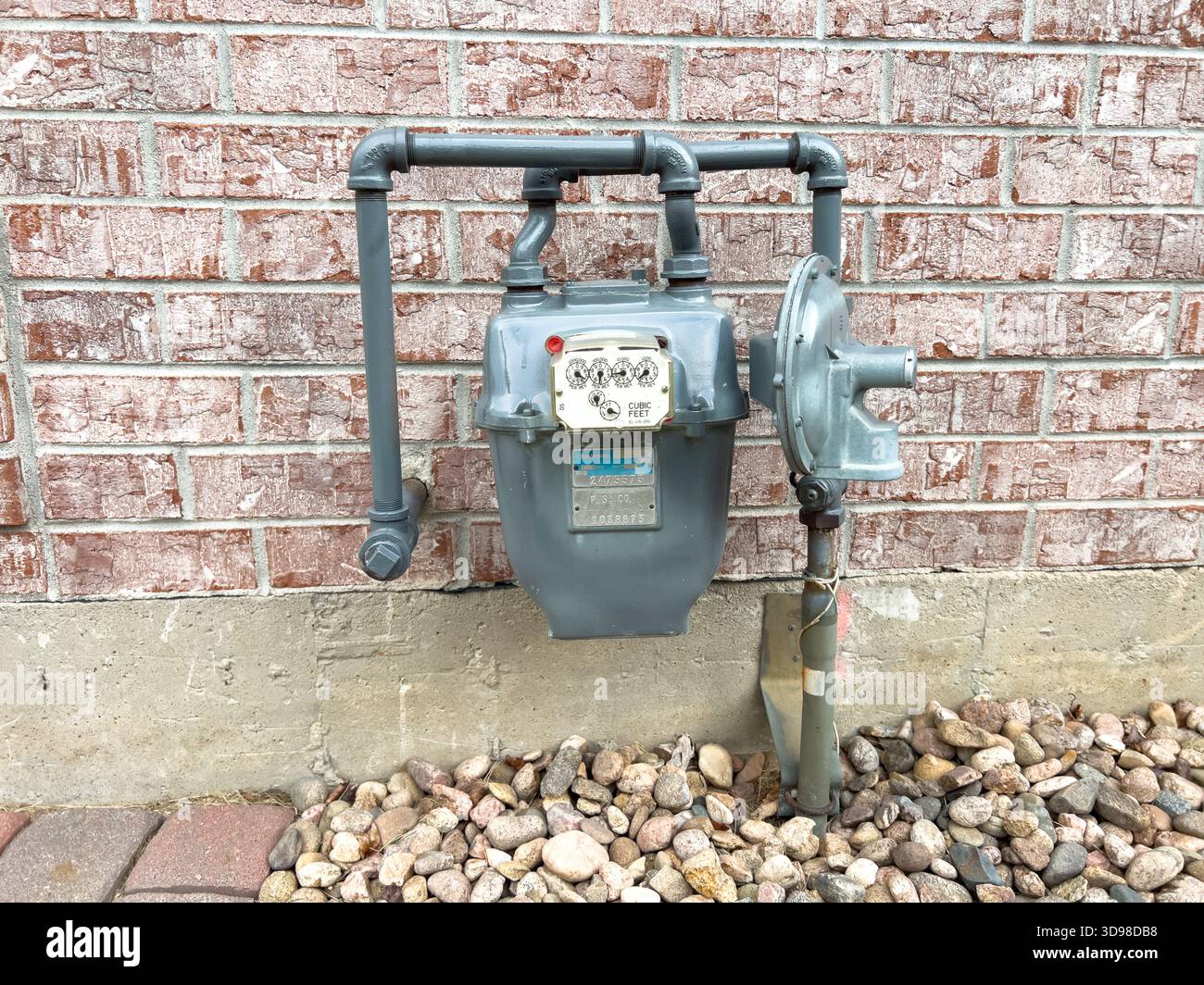 Residential gas meter with pipe fittings visible Stock Photo - Alamy