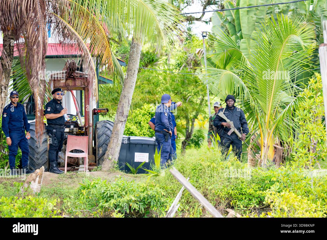 Police during a visit to Frederiksdorp Plantation in Paramaribo during ...