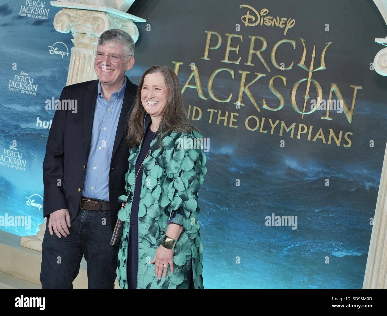 (L-R) Rick Riordan and wife Becky Riordan at the Disney+ Original ...