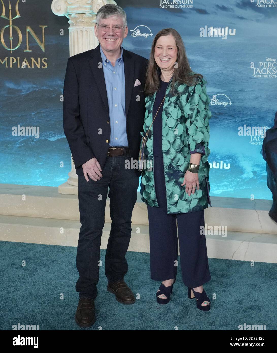 (L-R) Rick Riordan and wife Becky Riordan at the Disney+ Original ...