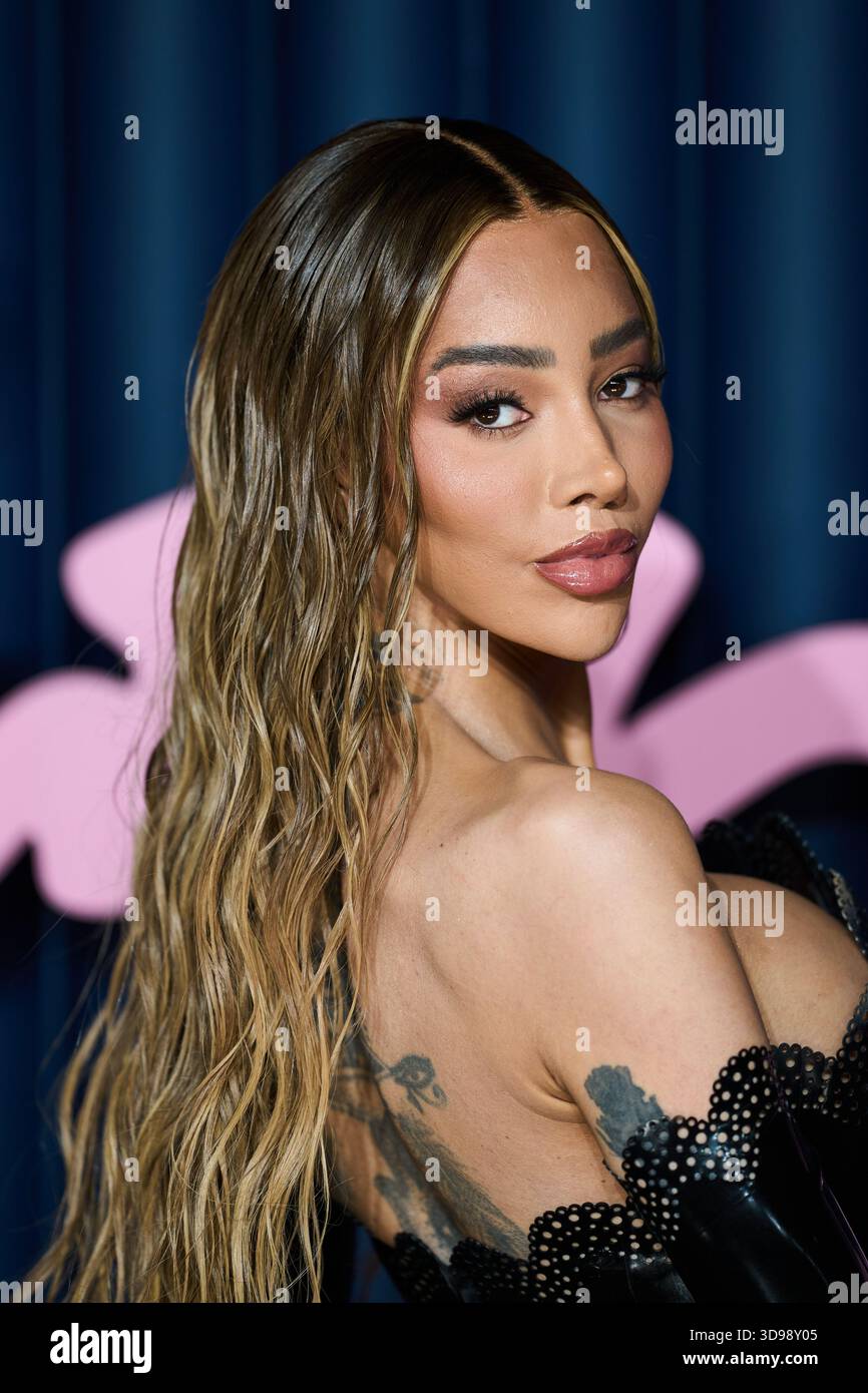 Munroe Bergdorf poses for photographers upon arrival at 'The Fashion ...