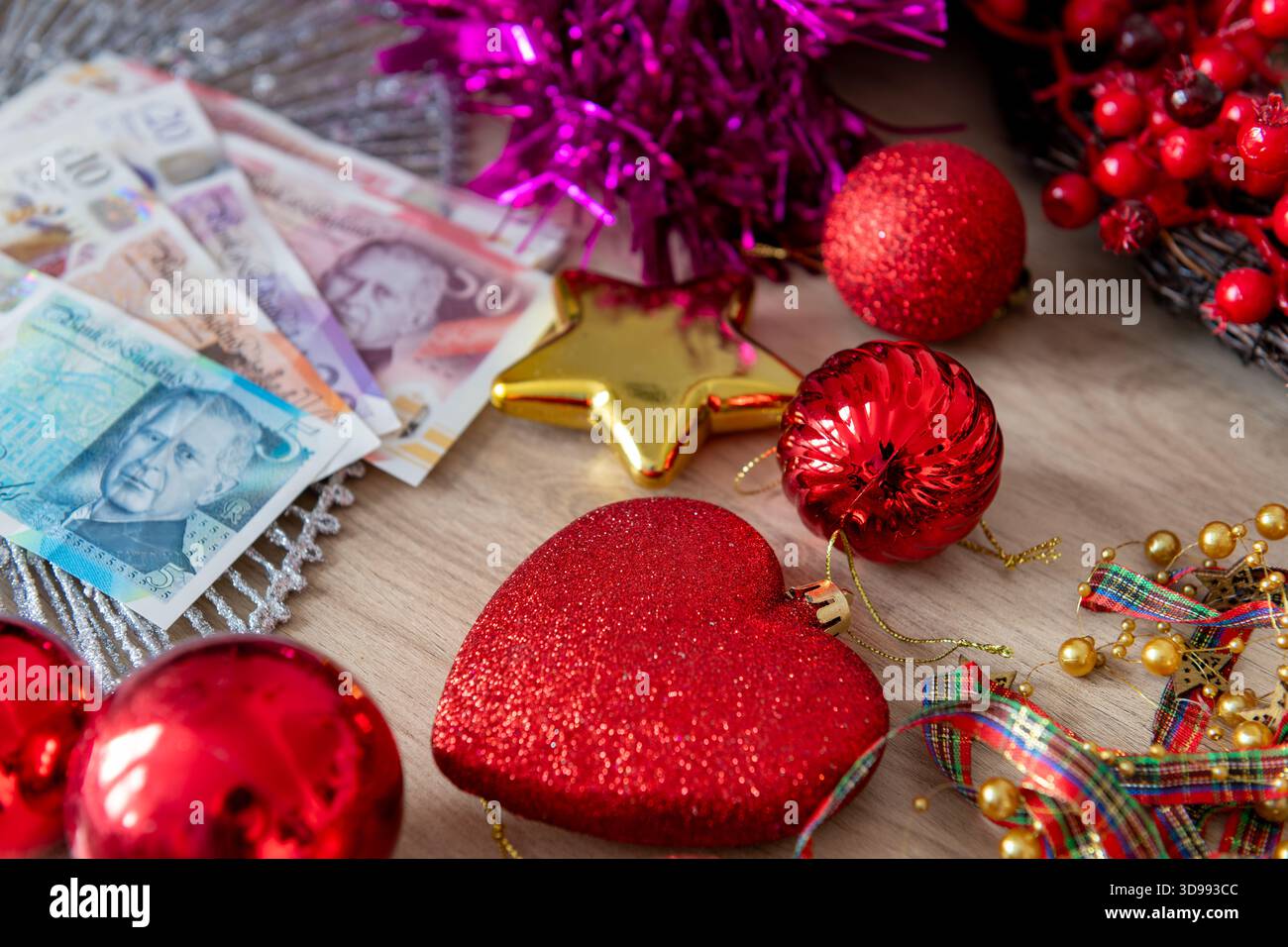 A close up of Christmas decorations on a table with a bunch of Pound ...