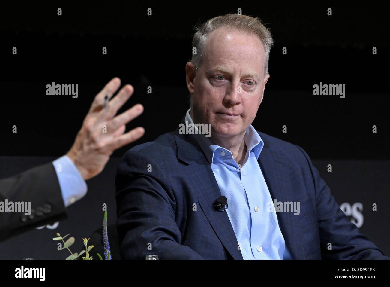 Patrick Conway (r), M.D., CEO Optum - UnitedHealth Group, speaks at the ...