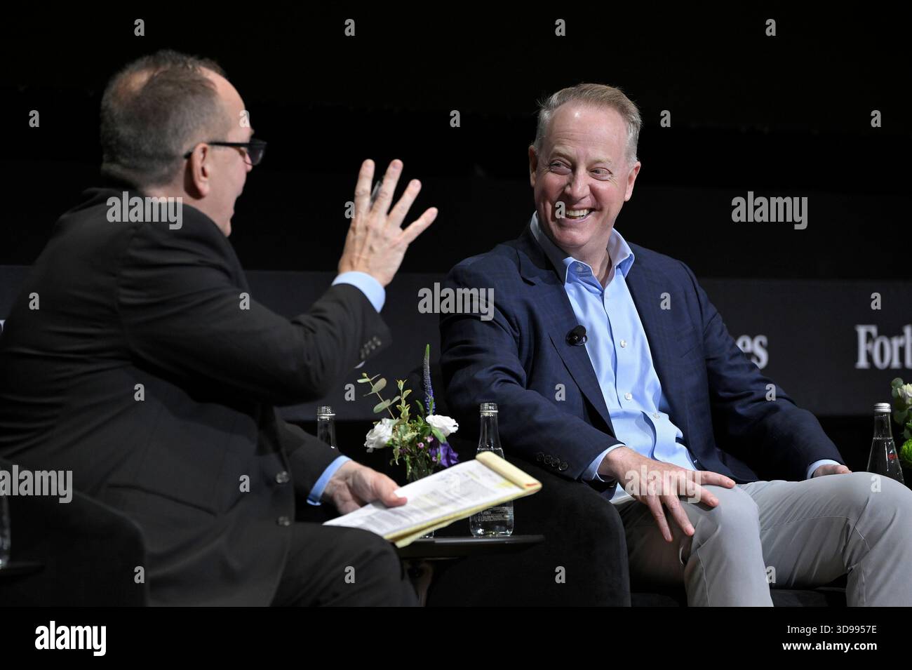 Patrick Conway (r), M.D., CEO Optum - UnitedHealth Group, speaks at the ...