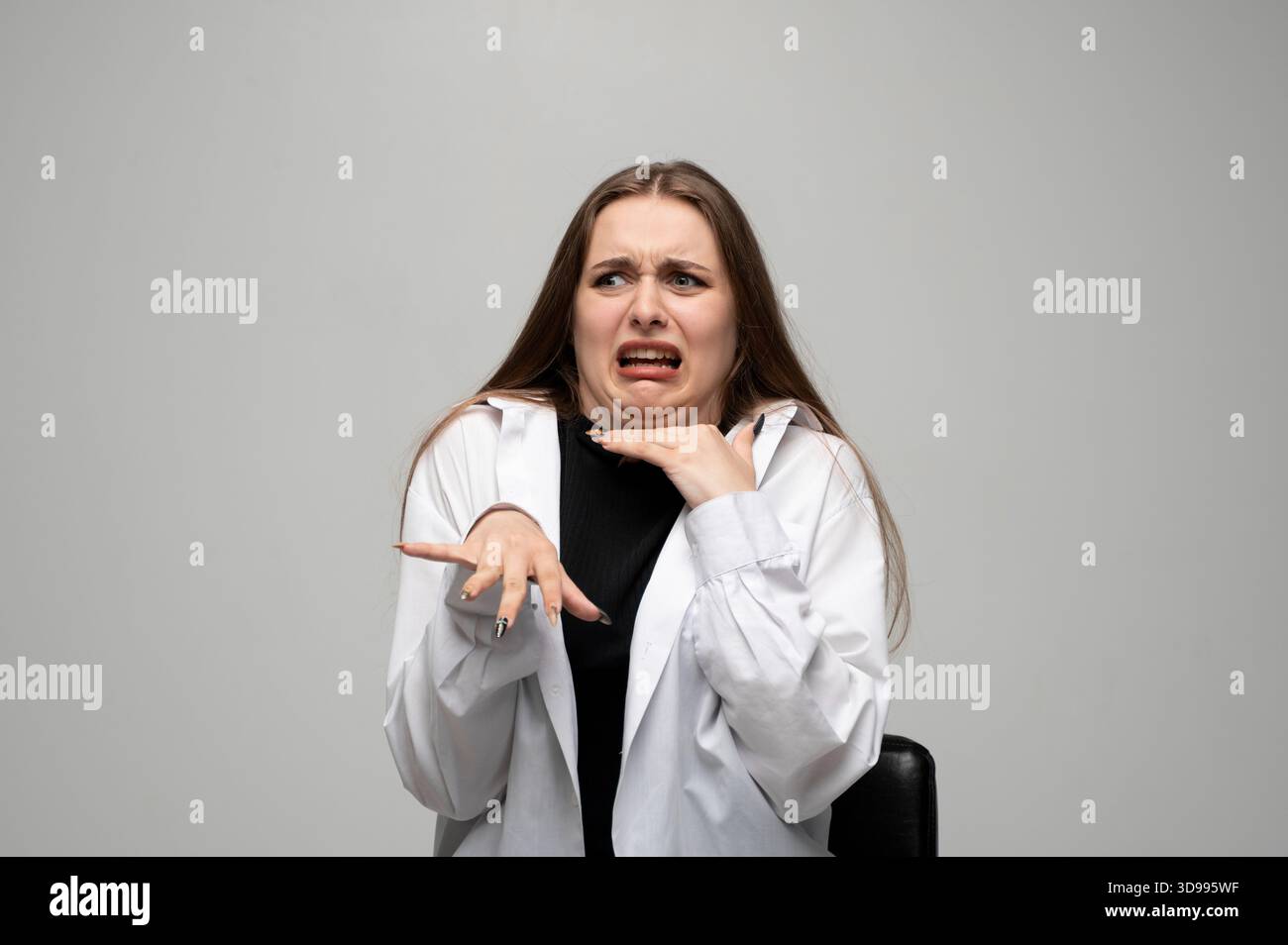 Woman showing strong disgust intense hi-res stock photography and ...