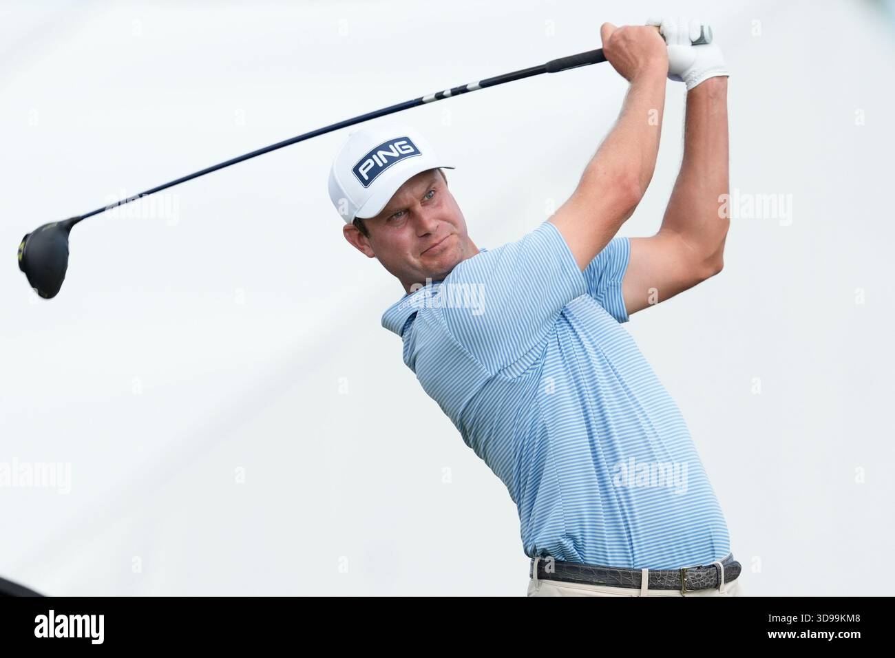Harris English, of the United States, watches his tee shot on the ...
