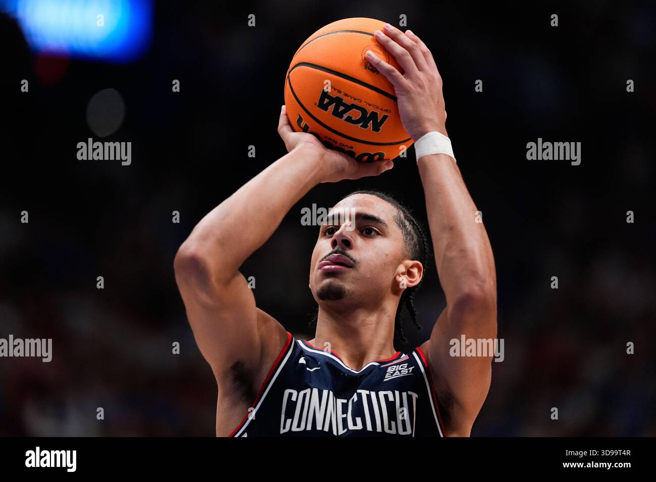UConn forward Jayden Ross shoots during the second half of an NCAA ...