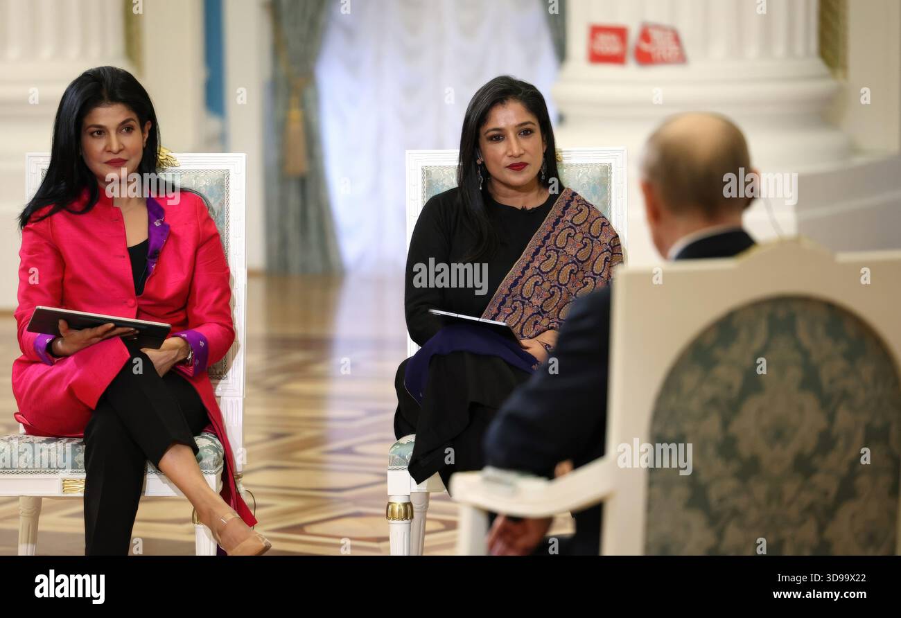 Moscow, Russia. 03 December, 2025. Russian President Vladimir Putin, right, listens to a ...