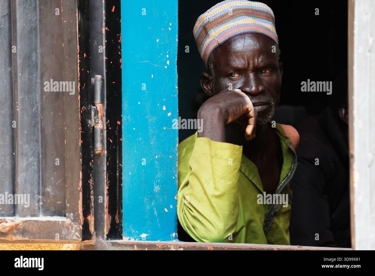 FILE - A worried parent of abducted school children looks on at St ...