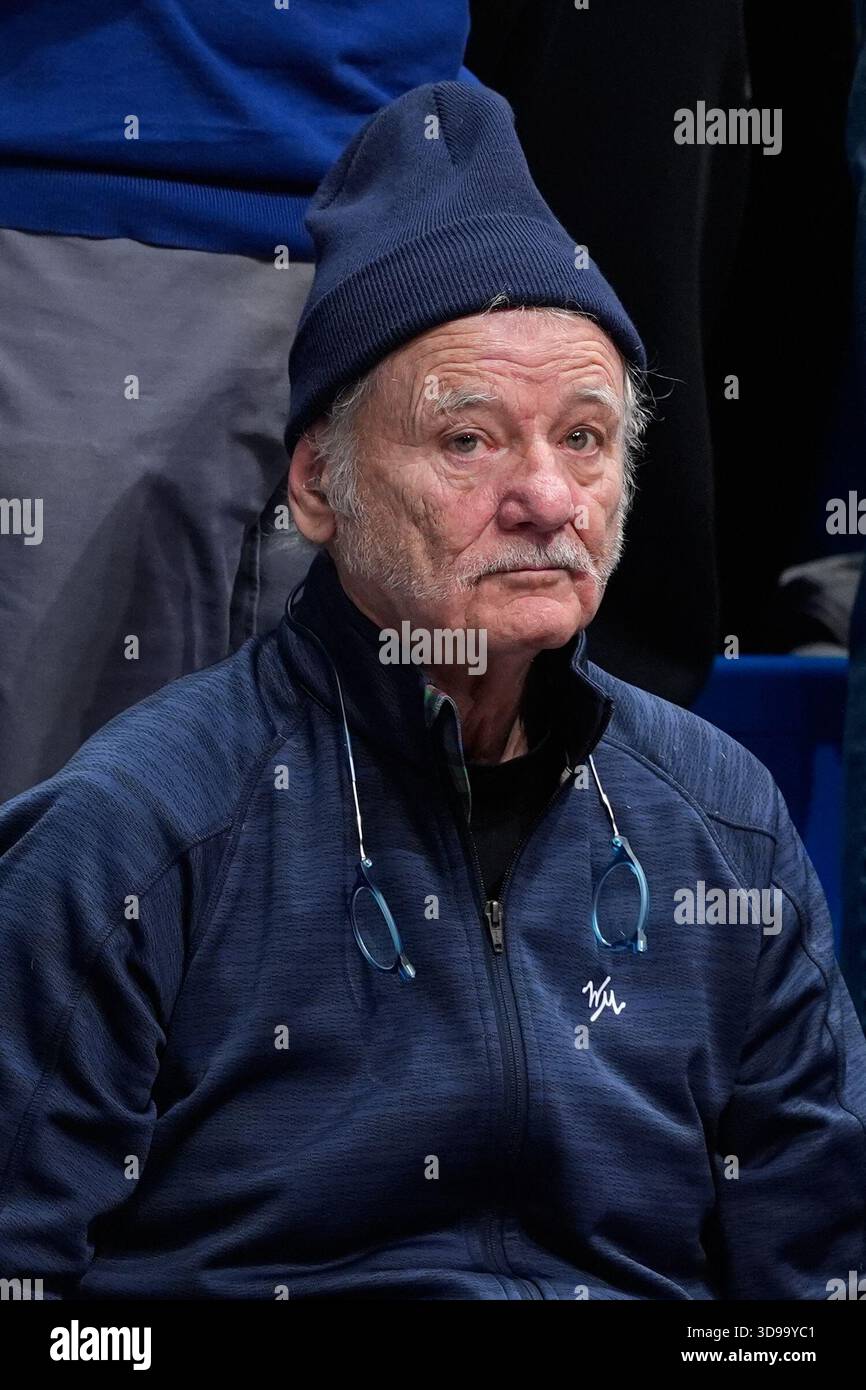 Actor and comedian Bill Murray watches an NCAA college basketball game ...