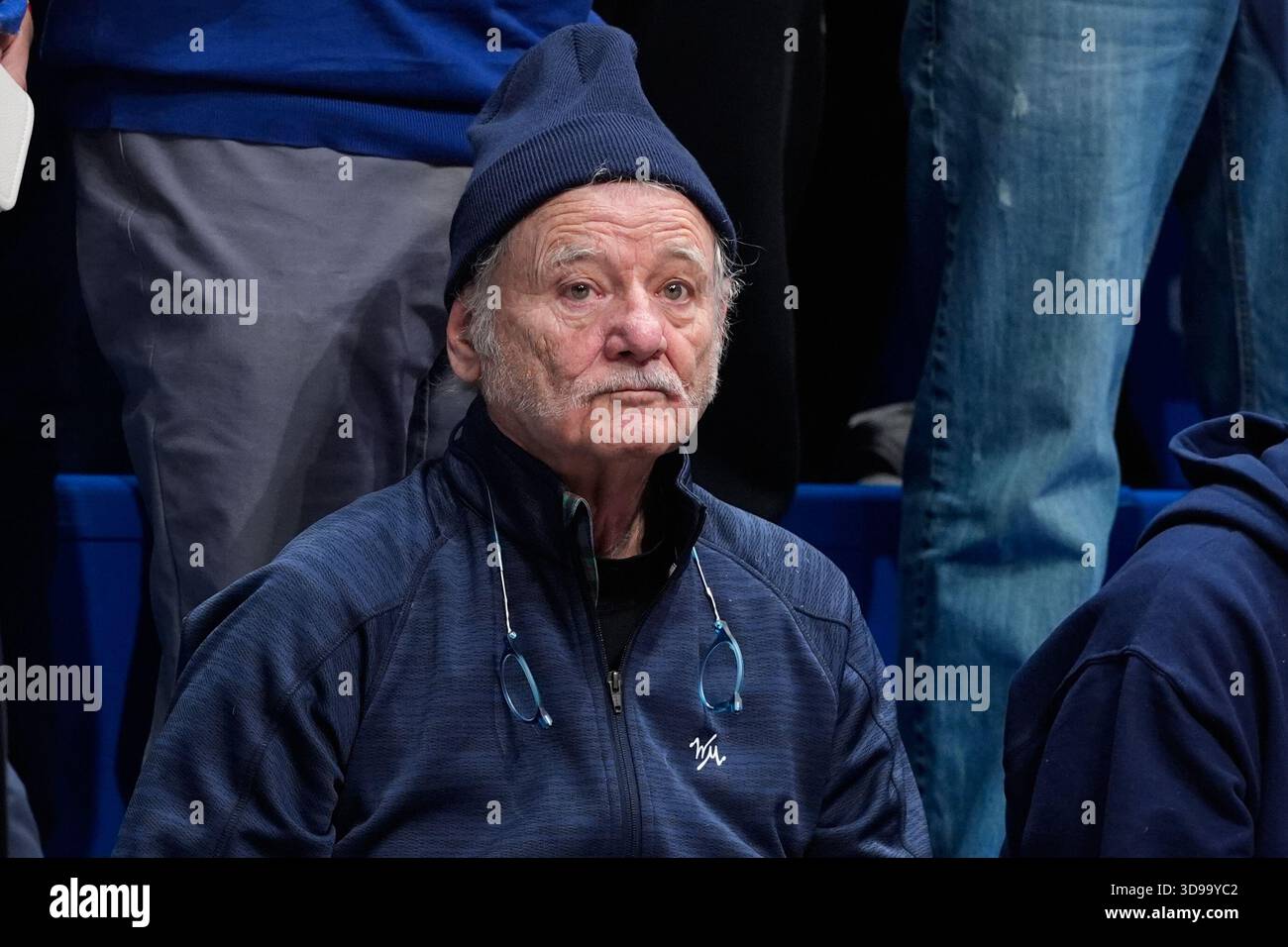 Actor and comedian Bill Murray watches an NCAA college basketball game ...
