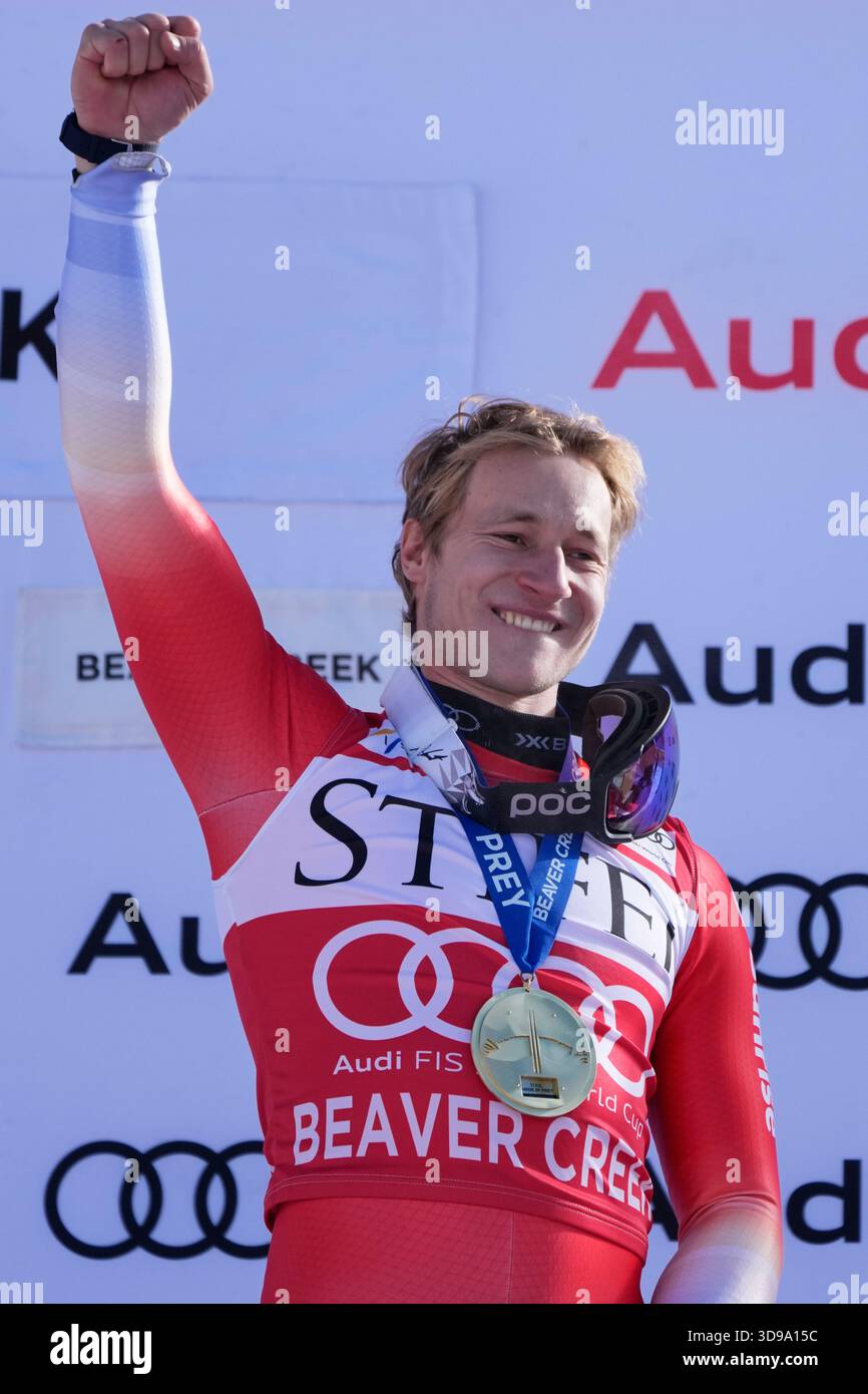 First place finisher Switzerland's Marco Odermatt celebrates after a ...