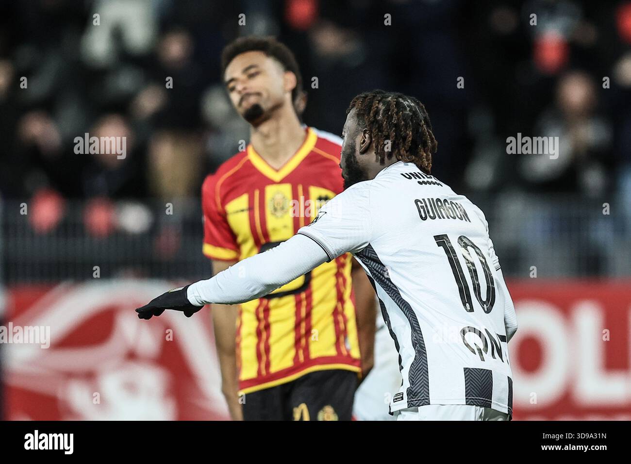 Charleroi's Parfait Guiagon celebrates after scoring during a soccer ...