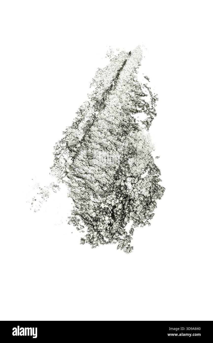 Black charcoal or makeup powder smear creating an abstract texture ...