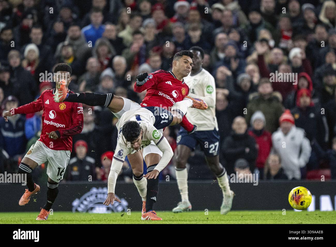 MANCHESTER, ENGLAND, DEC 04: Casemiro of Manchester United and Mateus ...