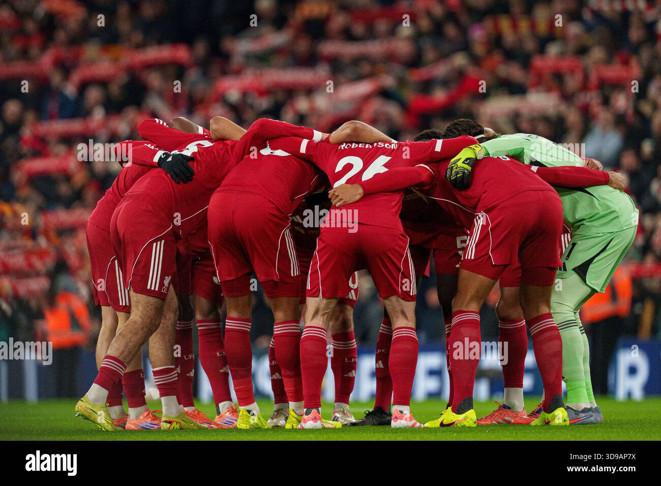 Liverpool FC players in a huddle during the Premier League match ...