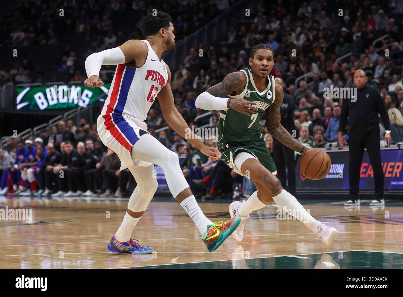 Milwaukee Bucks' Kevin Porter Jr. drives to the basket against Detroit ...