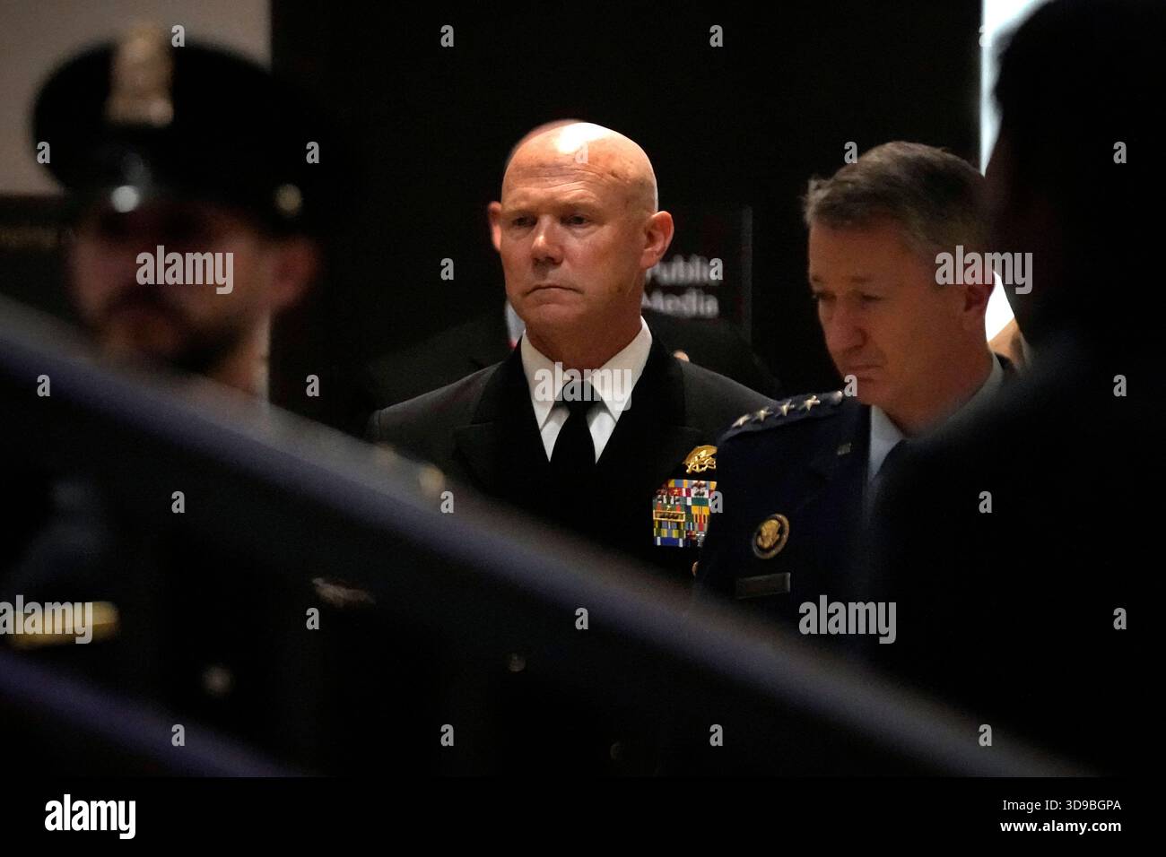 U.S. Navy Adm. Frank M. Bradley leaves after a meeting with senators on ...
