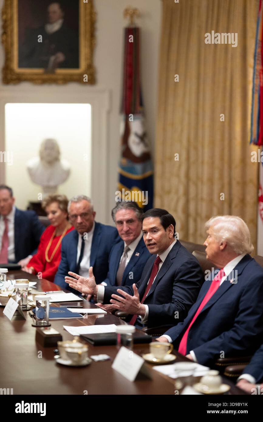 Secretary of State Marco Rubio speaks as President Donald Trump holds a ...
