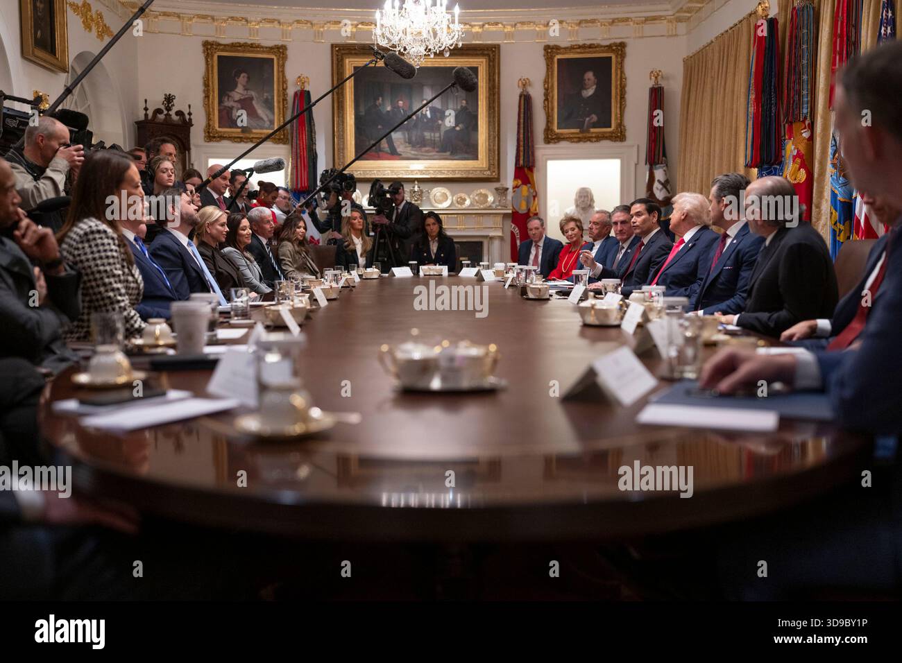 Secretary of State Marco Rubio speaks as President Donald Trump holds a ...