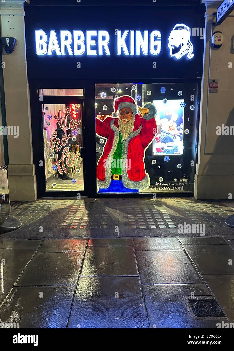 Santa in the window of Barber King on Baker Street, London, UK Stock ...