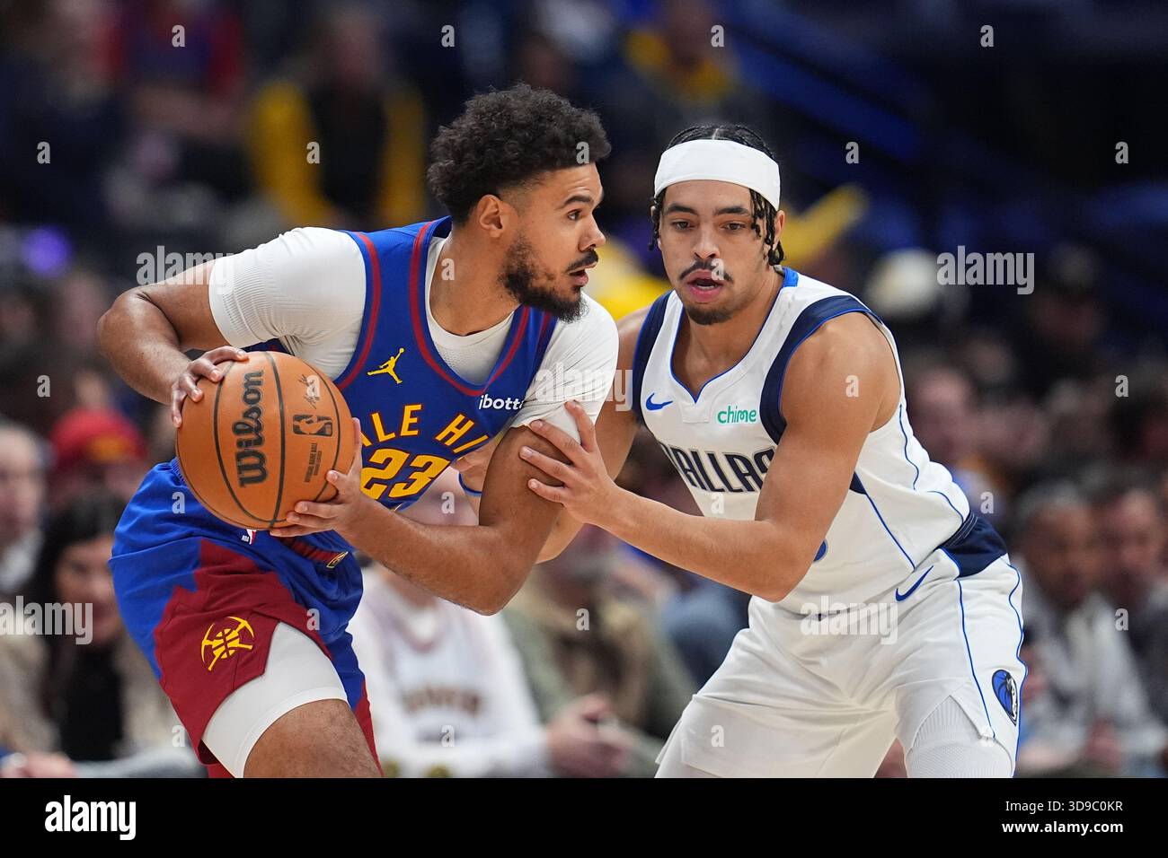 Denver Nuggets forward Cameron Johnson (23) and Dallas Mavericks guard ...