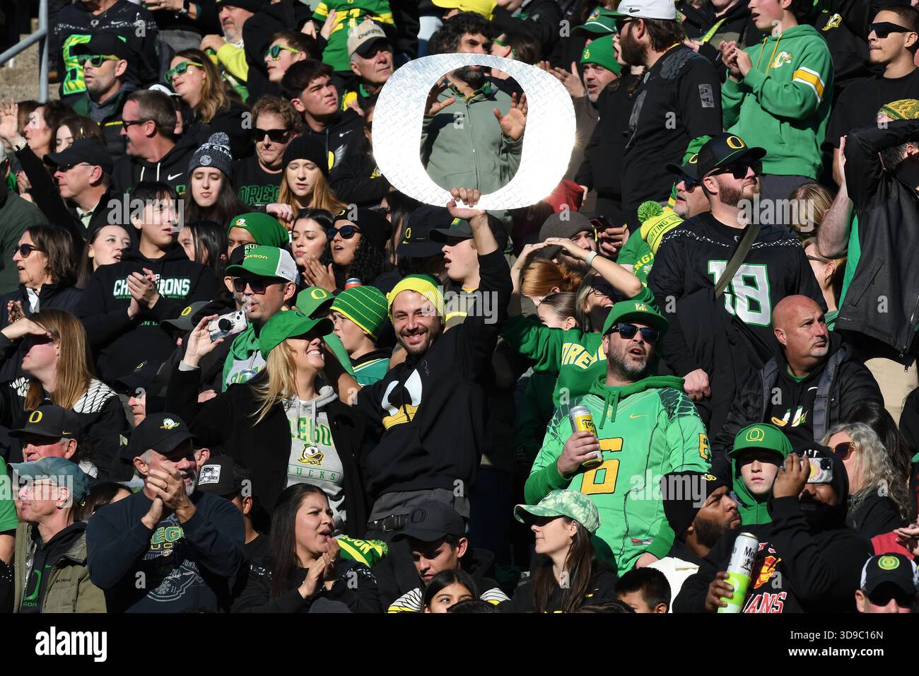 EUGENE, OR - NOVEMBER 22: An Oregon Ducks fan holds an Oregon logo sign ...