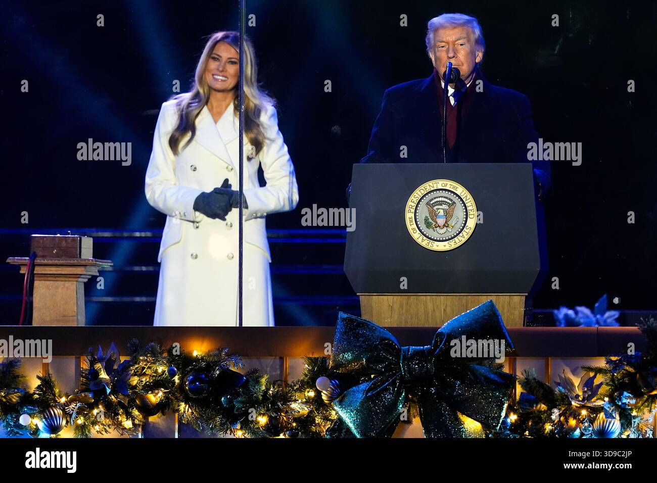 President Donald Trump, accompanied by first lady Melania Trump, speaks ...