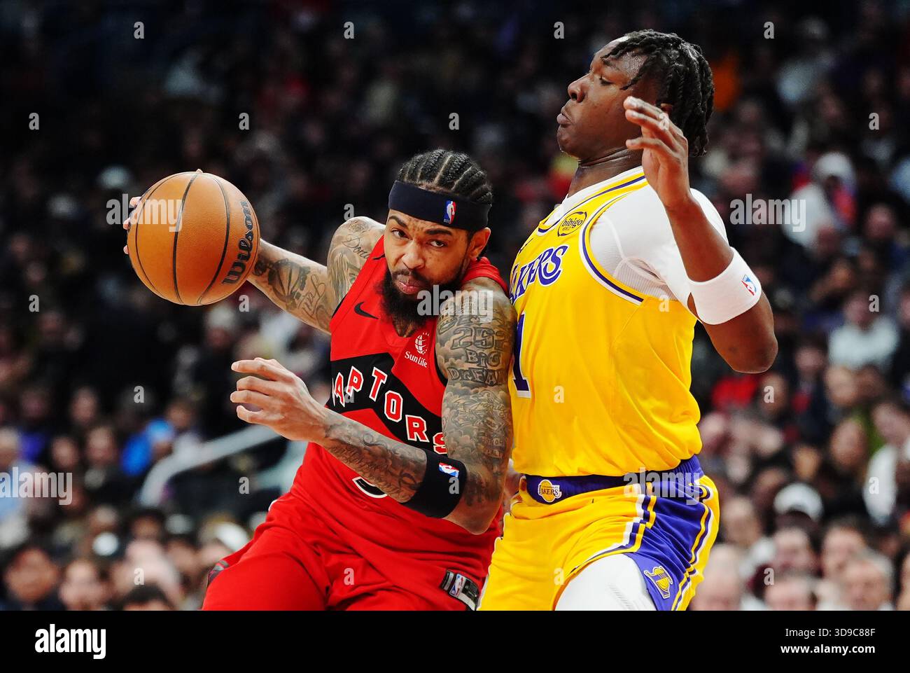 Toronto Raptors' Brandon Ingram (3) drives at Los Angeles Lakers' Adou ...