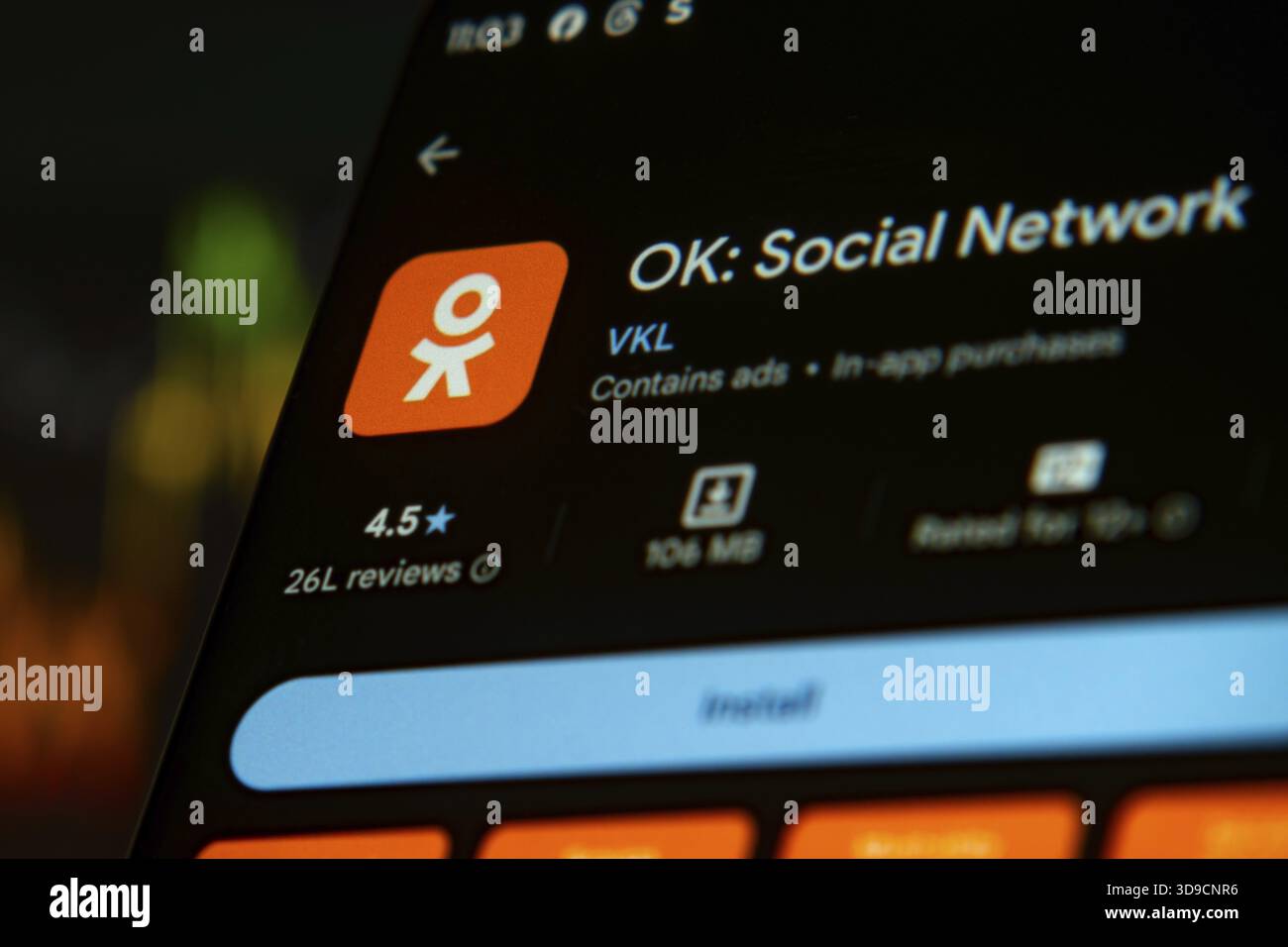 OK social network app logo on a smartphone screen, highlighted by a ...