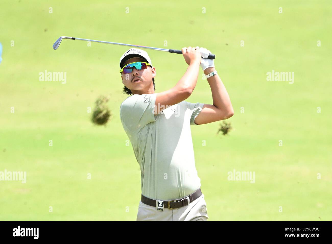 Min Woo Lee of Australia plays a shot in round two of the Australian ...