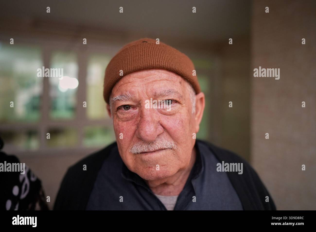 Syrian refugee Abdulilah Amin Dawoud, 73, poses for a picture at his ...