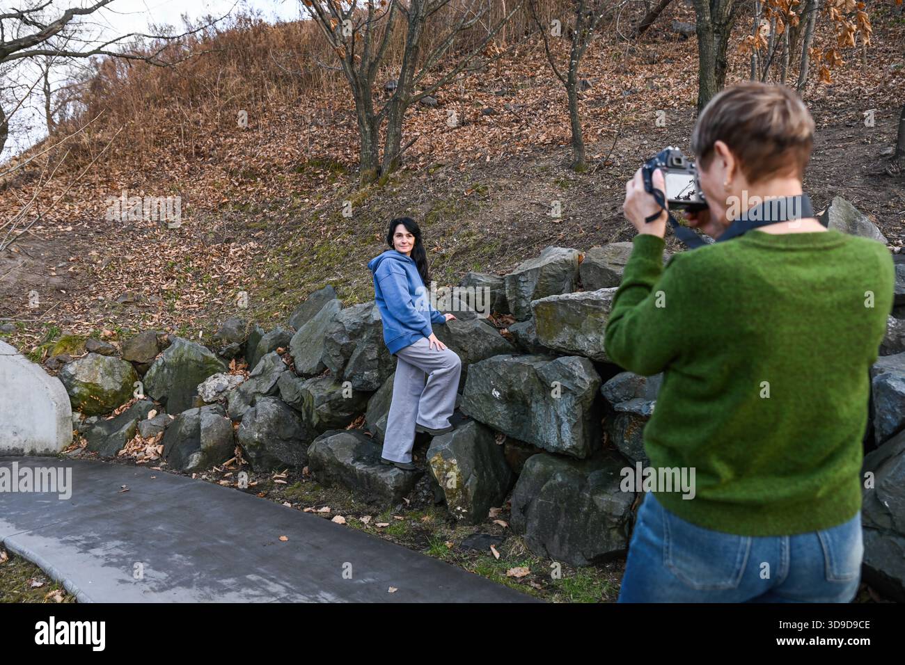 Two Russian friends enjoy a creative moment in the park as the senior ...