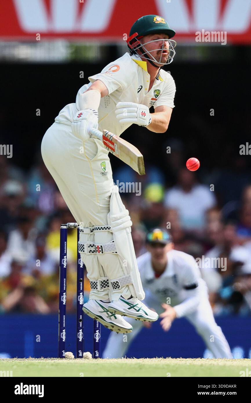 Australia's Travis Head reacts after the ball strucks during the second ...