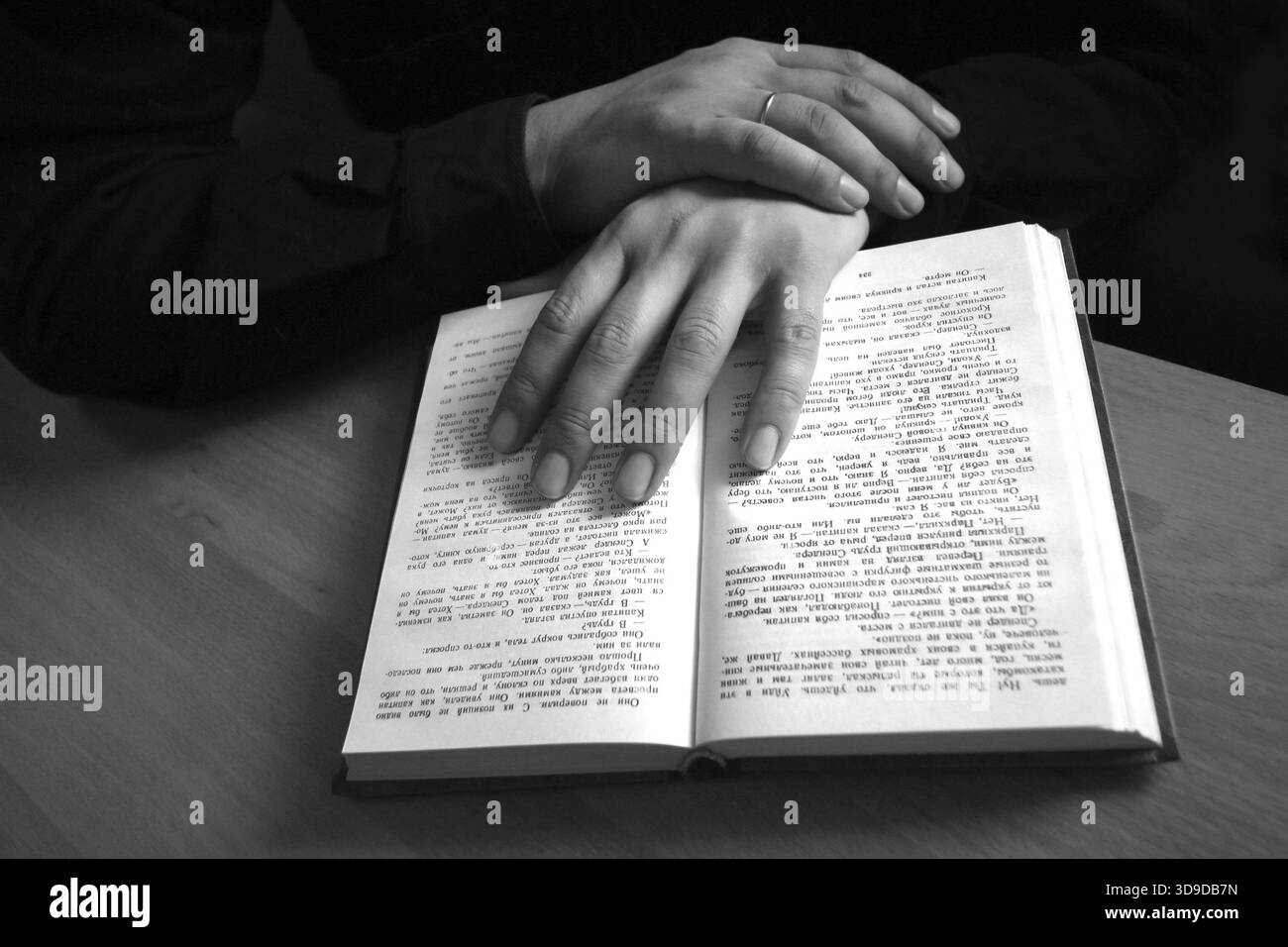 Hand hold book education Black and White Stock Photos & Images - Alamy