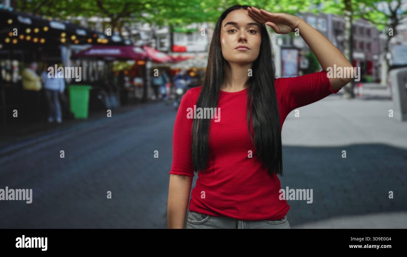 Woman hand forehead salute hi-res stock photography and images - Alamy