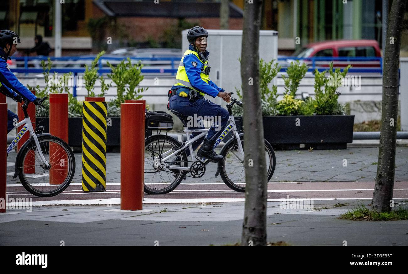 THE HAGUE - Law enforcement officers monitor bicycles ANP /HOLLANDSE ...