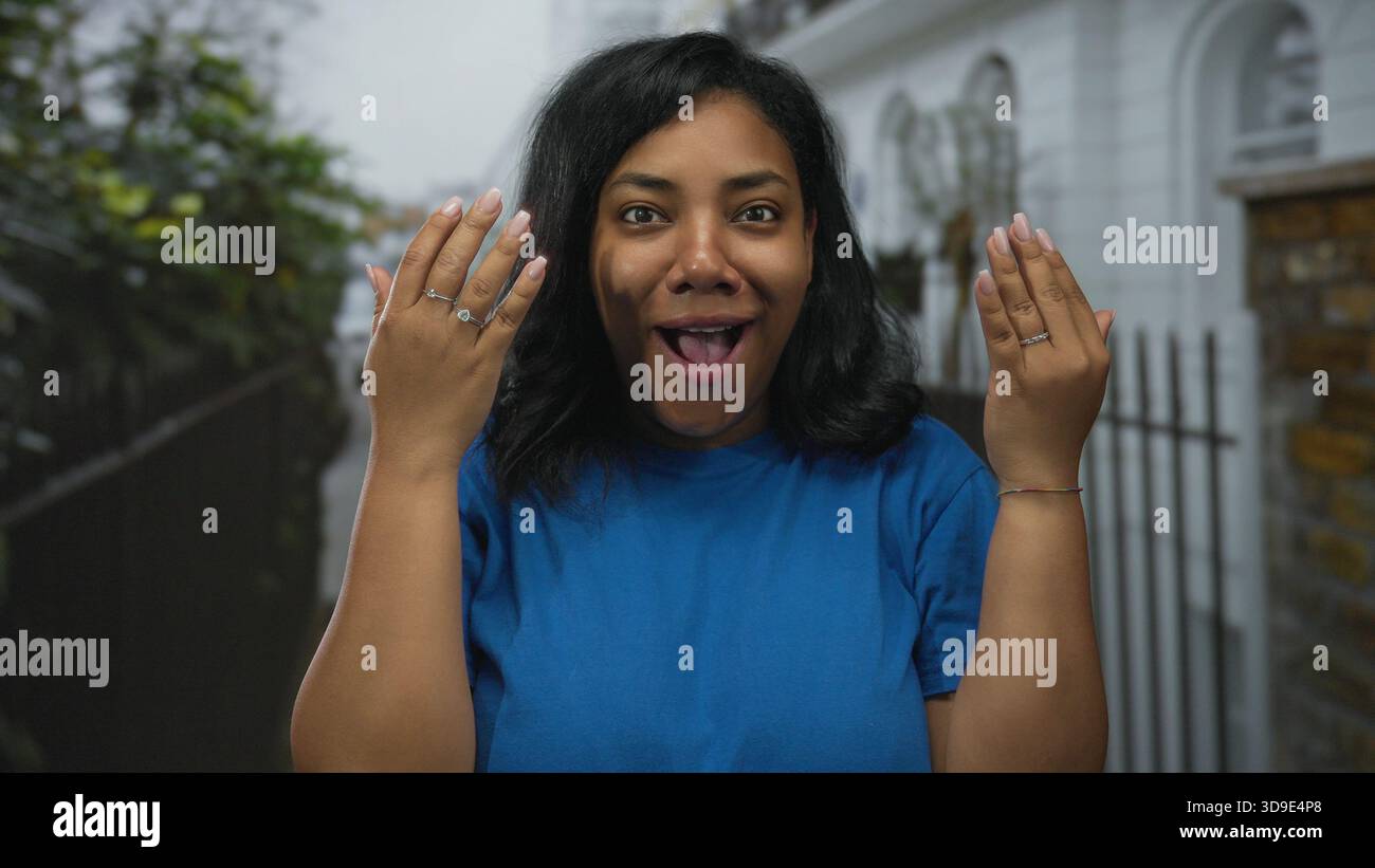 Woman covers eyes on street hi-res stock photography and images - Alamy