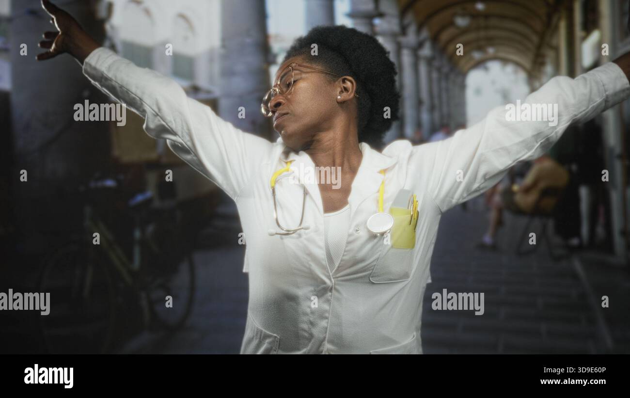 Woman doctor with stethoscope stretches arms and clasps hands behind ...