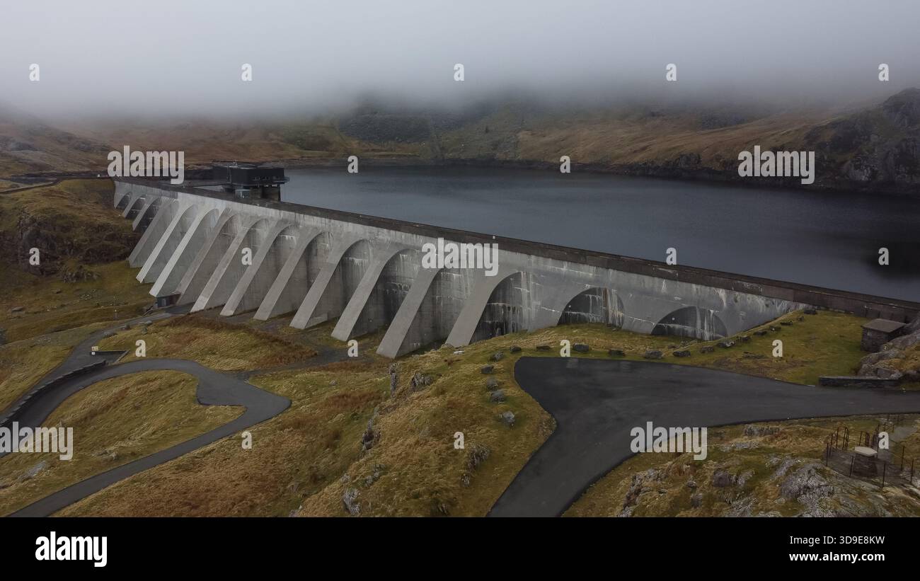 Aerial view of Stwlan Dam with the winding access road below Stock ...