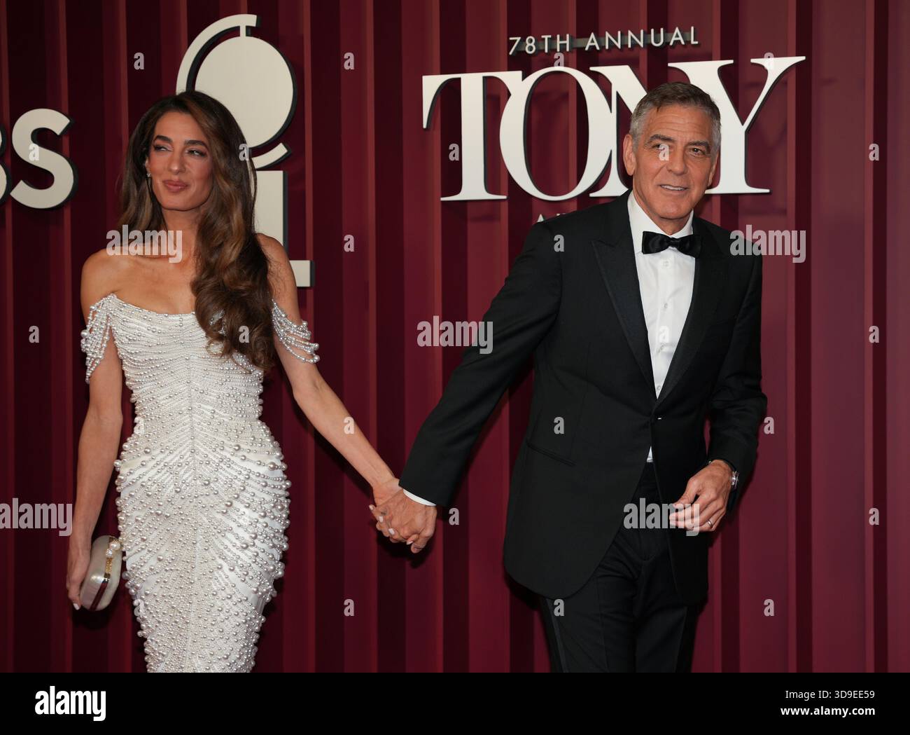 George and Amal Clooney arrive on the red carpet at The 78th Annual Tony Awards at Radio City ...