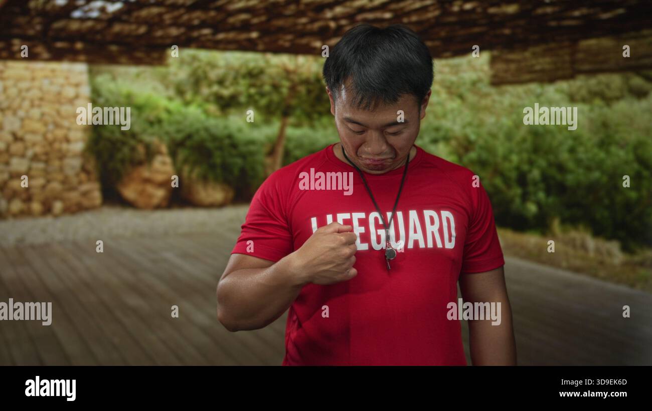Lifeguard man points finger hi-res stock photography and images - Alamy
