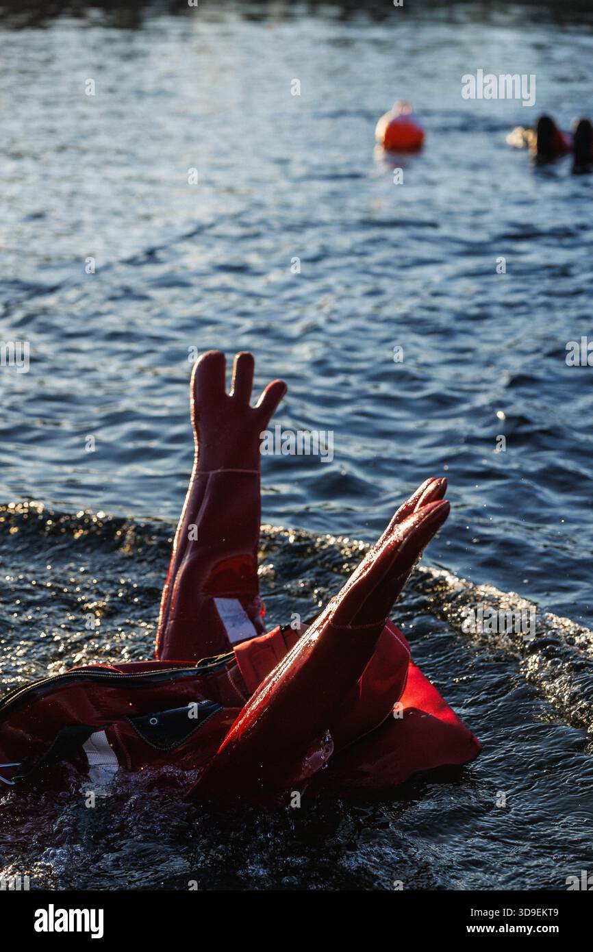 Gloved Hand Reaching From Cold Water, Fingers Stock Photo - Alamy