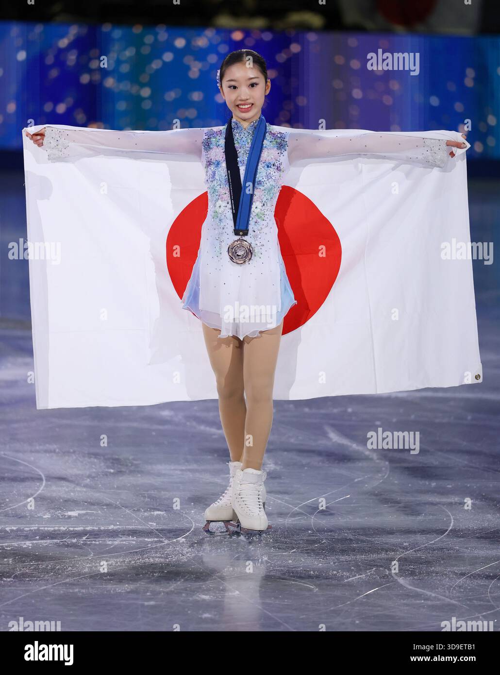 Mei OKADA poses for photos during an award ceremony for the junior ...