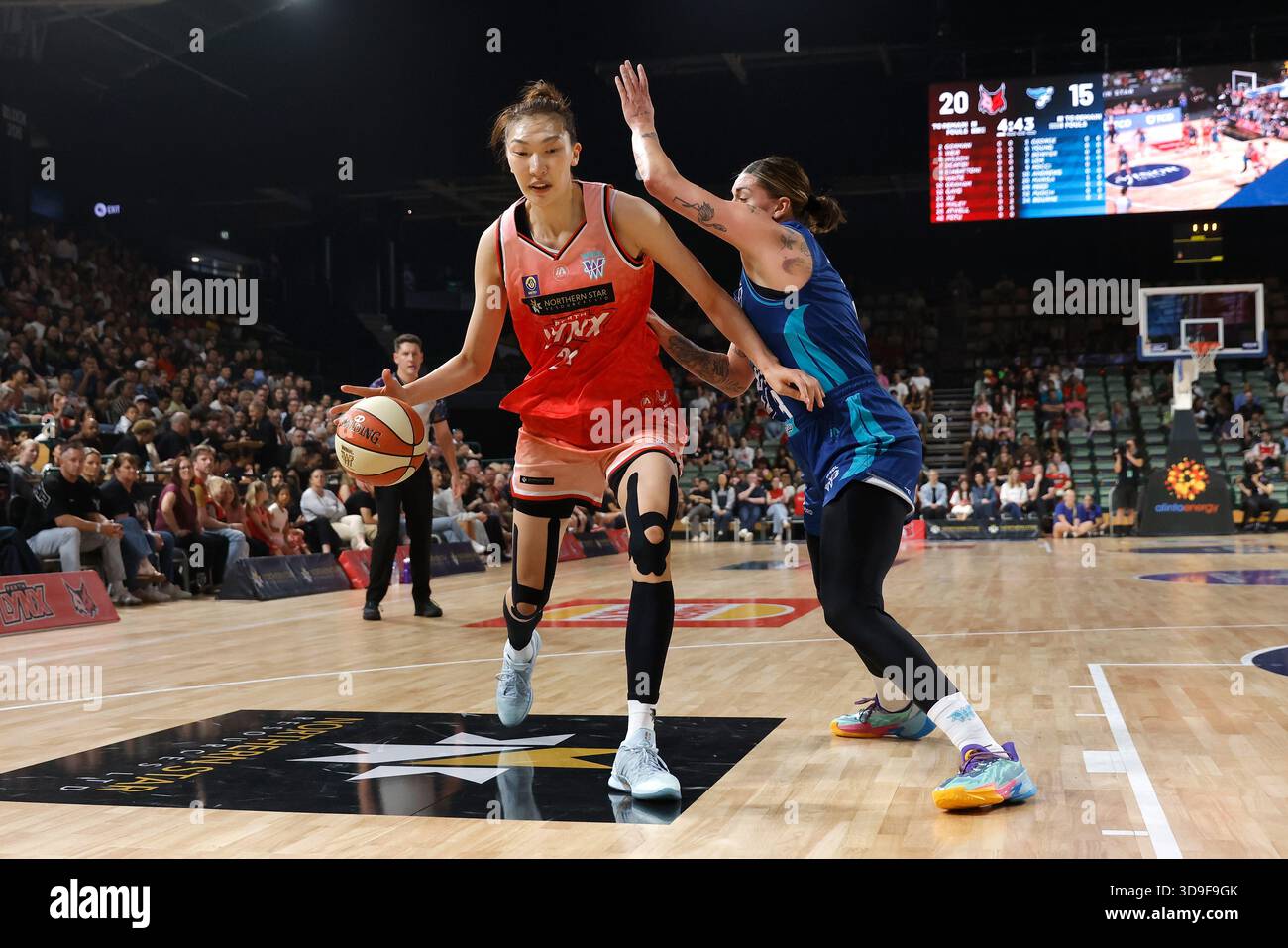Han Xu of the Lynx under pressure from Cayla George of the Flyers ...